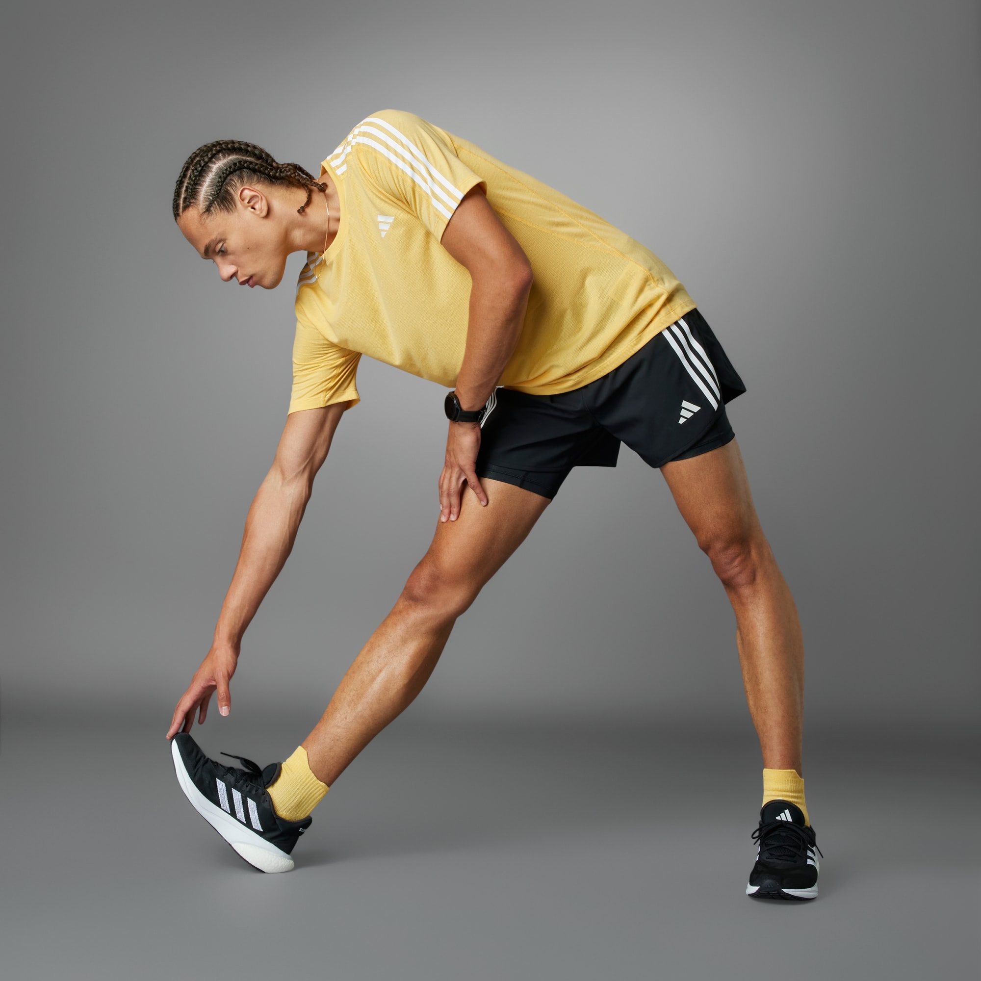 Shorts 2 em 1 Own the Run Três Listras - Preto adidas | adidas Brasil