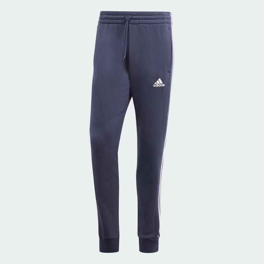 adidas Essentials Fleece 3-Stripes Tapered Cuff Joggers - Blue | adidas UK