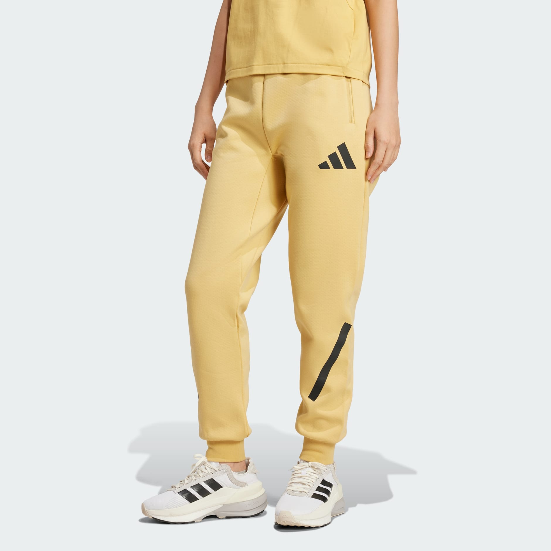 adidas Pantaloni adidas Z.N.E. - Beige | adidas Romania