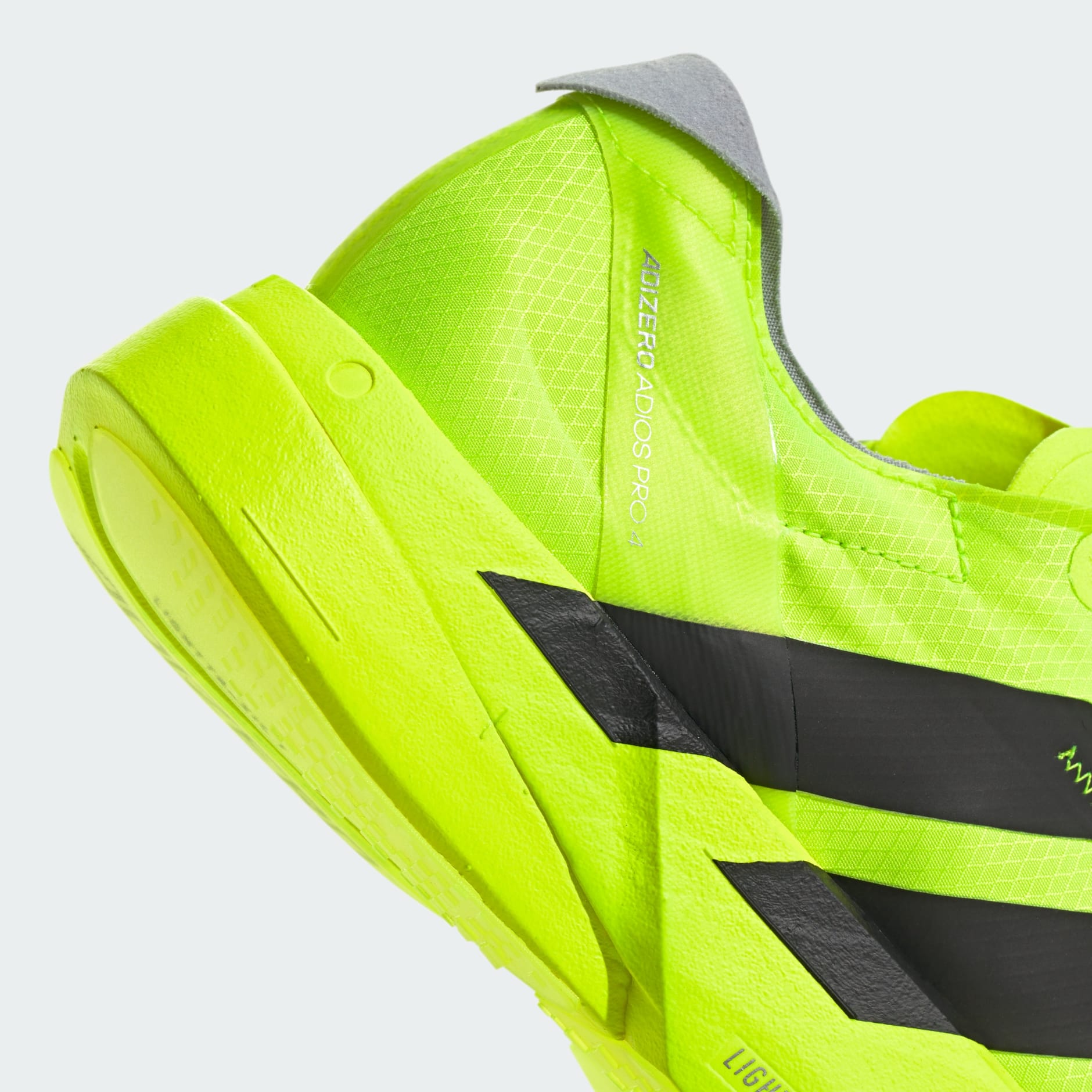 SHOES - Adizero Adios Pro 4 Shoes - Green | adidas Bahrain