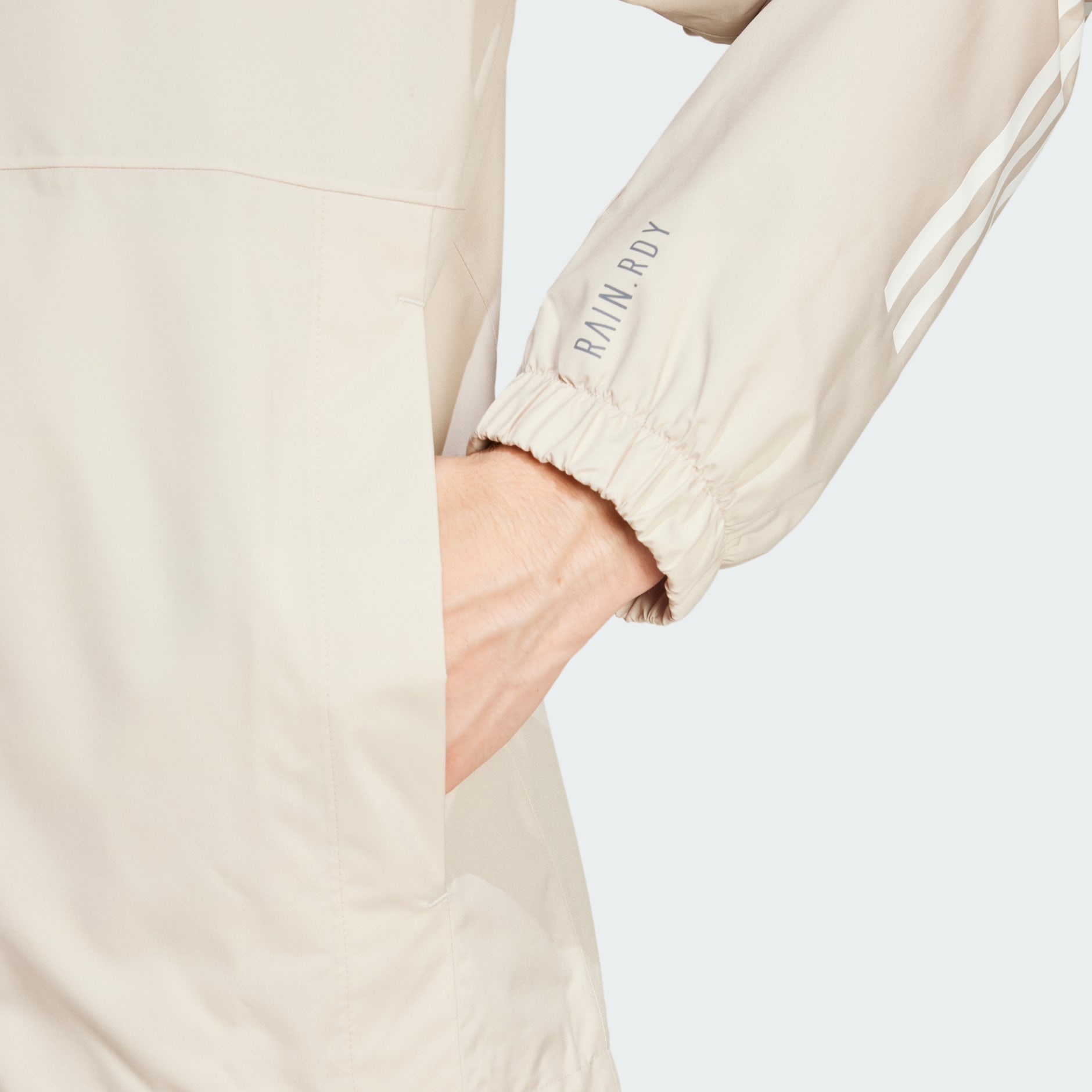 Clothing - Essentials 3-Stripes RAIN.RDY Jacket - Beige | adidas Israel