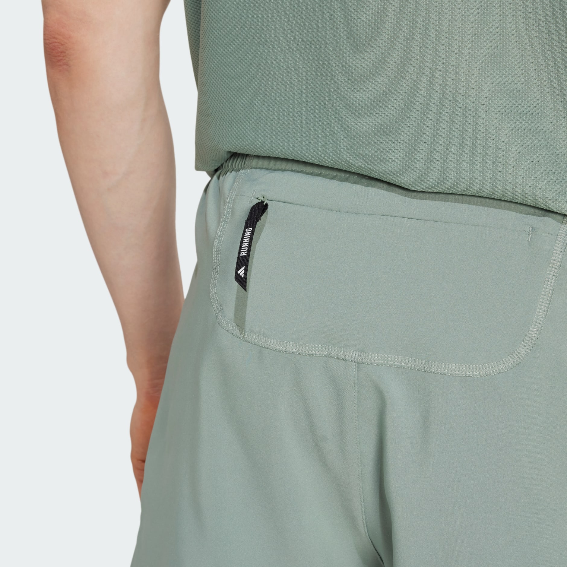 adidas Own the Run CLIMACOOL 2-in-1 Shorts - Green | adidas UAE