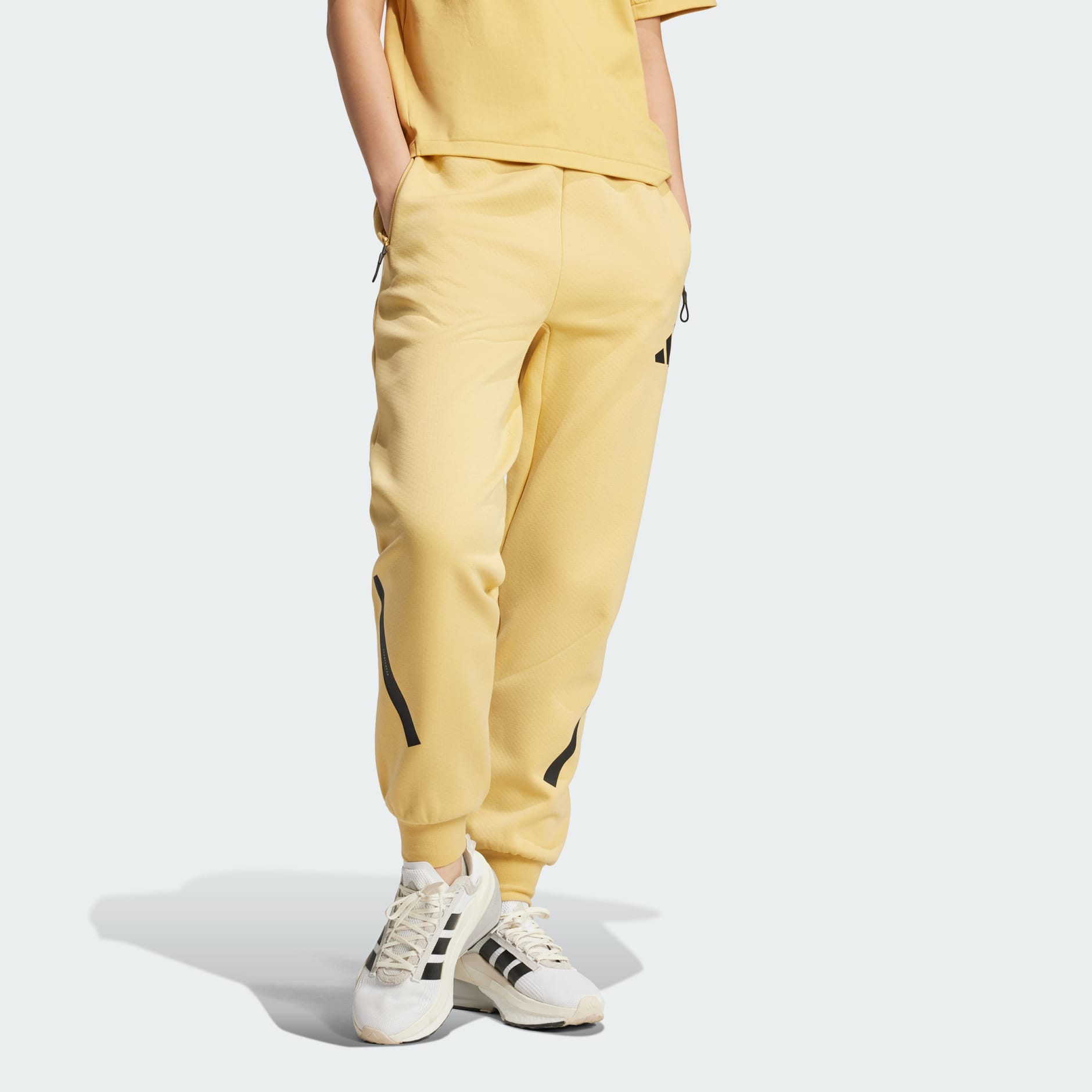 adidas Pantaloni adidas Z.N.E. - Beige | adidas Romania